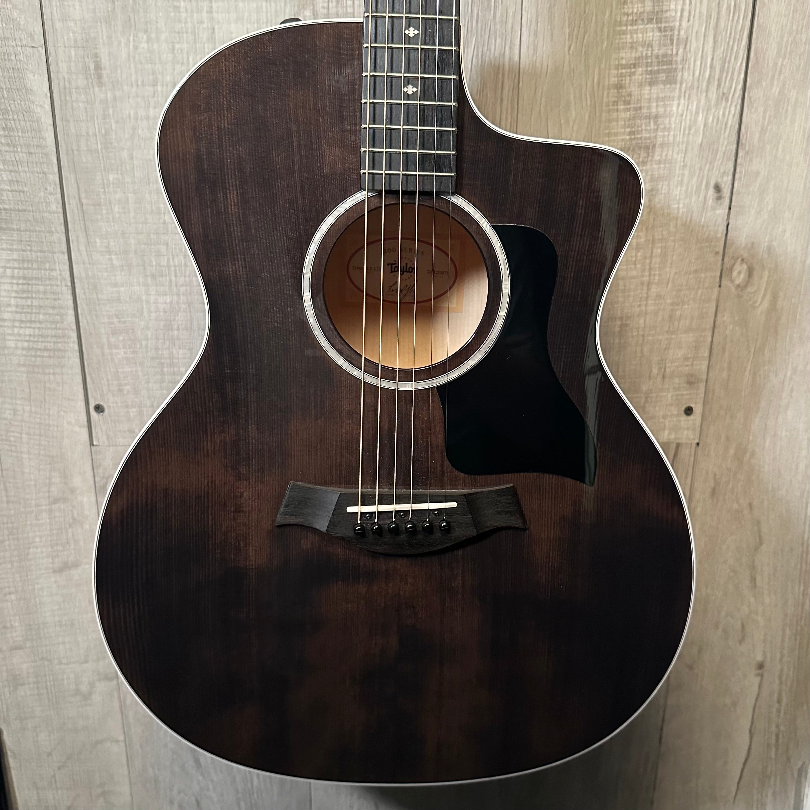 Used Taylor 214CE DLX LTD Trans Black w/case TSS3578 – Tone Shop Guitars